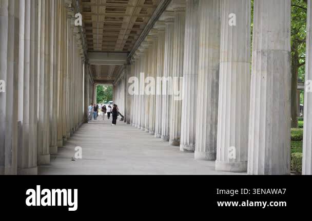 Repeating stone columns form a bright Berlin colonnade with a clear ...