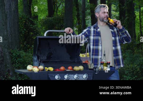 Barbeque grill with summer sunlight. Cooking meat on the grill during ...