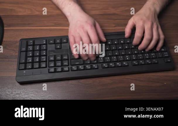 Overhead top view of Caucasian male hands hitting keyboard and throwing ...