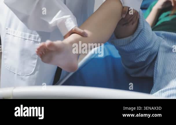 doctor in uniform examining patient in hospital or office, clinic ...