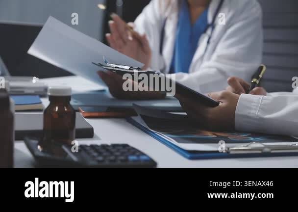 doctor with patient writing in office Stock Video Footage - Alamy