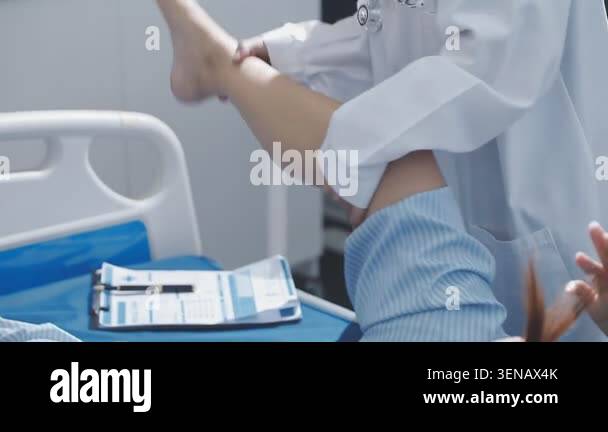 doctor checking blood pressure of a patient Stock Video Footage - Alamy