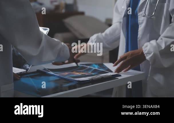 doctor examining x - ray in medical office Stock Video Footage - Alamy