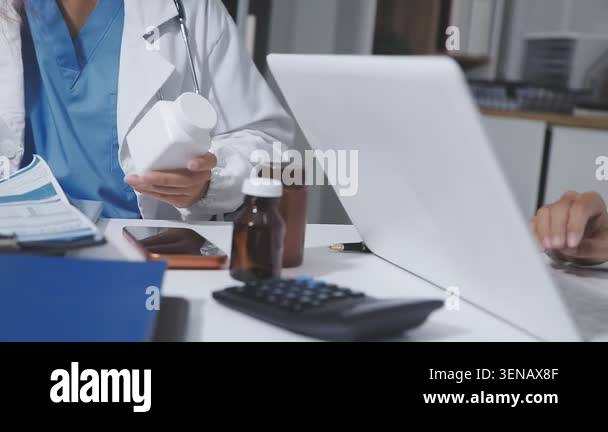 doctor holding pills in the hands and prescription for treatment of ...
