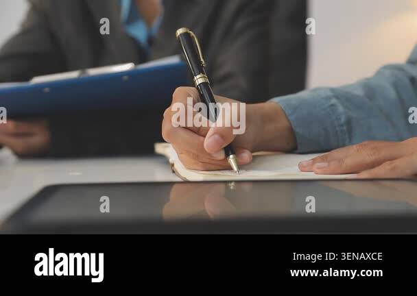 businessman writing in notebook Stock Video Footage - Alamy