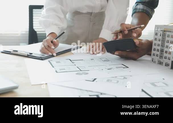 architect engineer designer working and drawing new project in office ...
