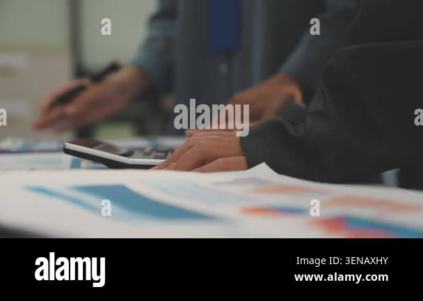 close - up of businessmen working on a project at modern office Stock ...