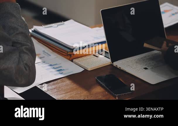 businessman using laptop while working at the table Stock Video Footage ...