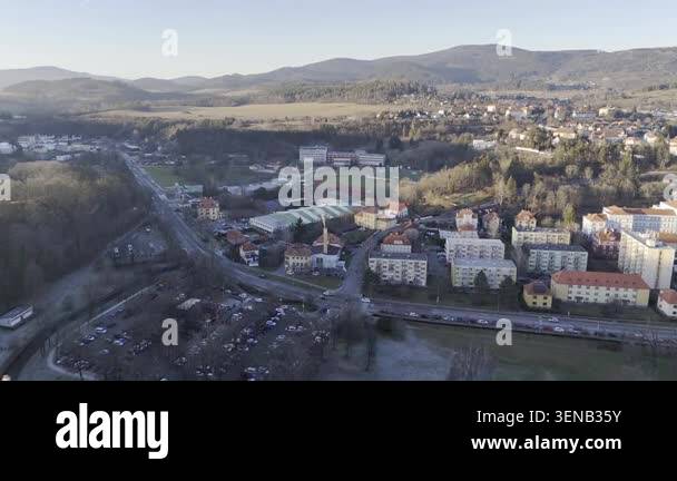 An aerial perspective showing houses, apartment buildings, and a sports ...