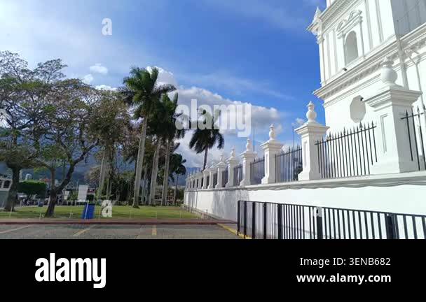 High angle view from a video frame showing the white stone fence and ...