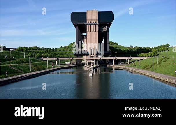 Static view of barge slowly ascending inside canal boat lift caisson as ...