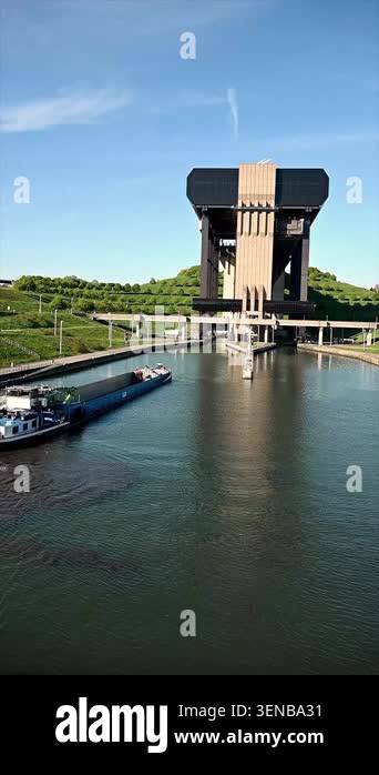 Static view of cargo barge gliding through Strepy-Thieu funicular boat ...