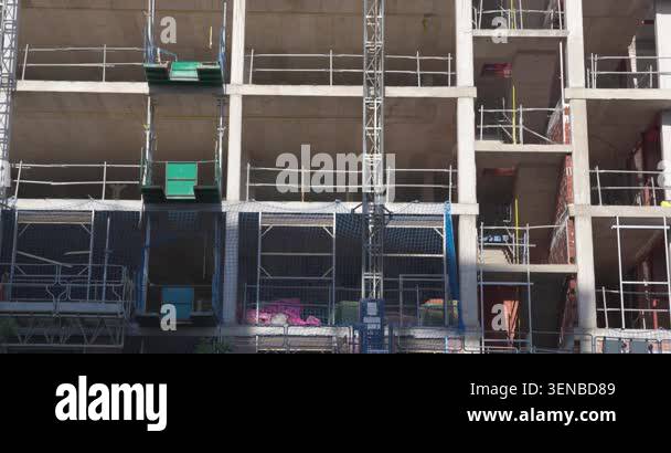 Concrete Residential Structure Under Construction with Scaffolding and ...