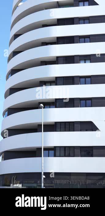 Vertical Close-Up of Curved Modern Residential Building Facade Stock ...