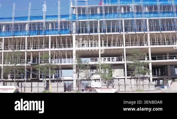 Large multi-storey building under construction with reinforced concrete ...