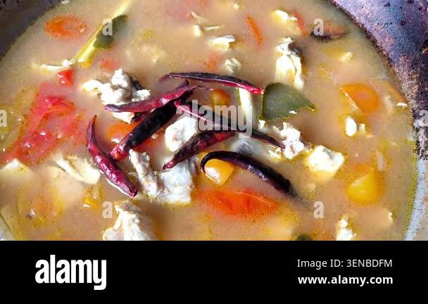 Cooking Tom Kha Gai in pan, Thai famous food Stock Video Footage - Alamy