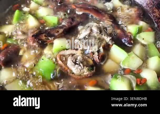 Boiling roasted duck with wax gourd in pot, indoor Chiangmai Thailand ...