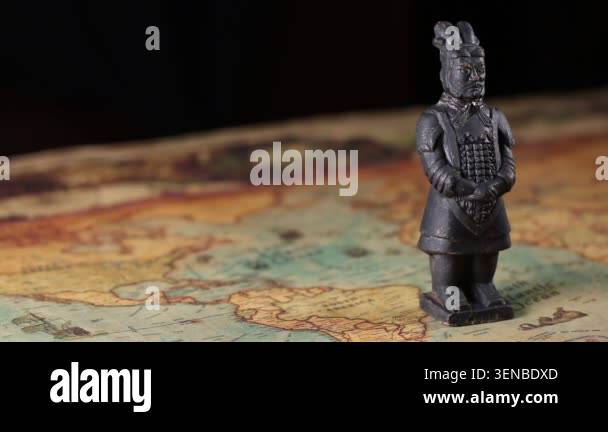 Close up of a Terracotta warrior statue on a very old world map Stock ...