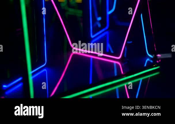 Glowing Neon Light Ribbons Flowing Through Dark Space. Colorful Neon ...