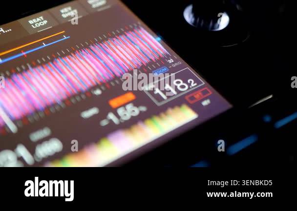 Close Up Of DJ Controller Screen Displaying Audio Waveform ...