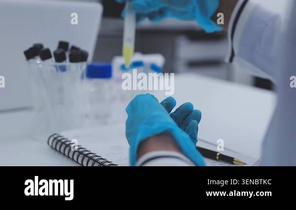scientist working with sample in laboratory Stock Video Footage - Alamy