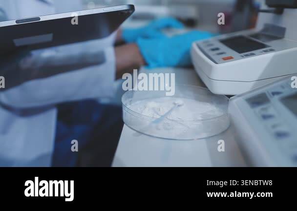 the laboratory assistant is holding a test tube with blood Stock Video ...