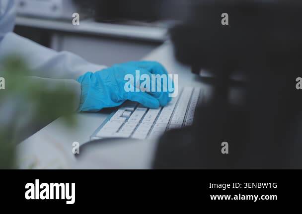 scientist using a laptop computer Stock Video Footage - Alamy