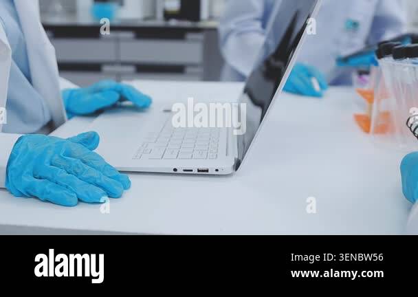 scientist using laptop in laboratory Stock Video Footage - Alamy