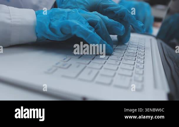 a man is typing on a keyboard Stock Video Footage - Alamy