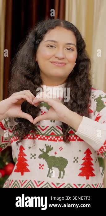 Vertical Video of Indian Woman Making Heart with Hands, Christmas Tree ...