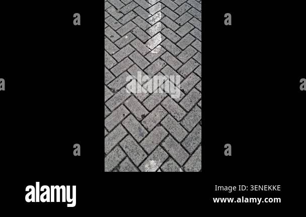 A vertical centered static shot capturing the geometric texture pattern ...