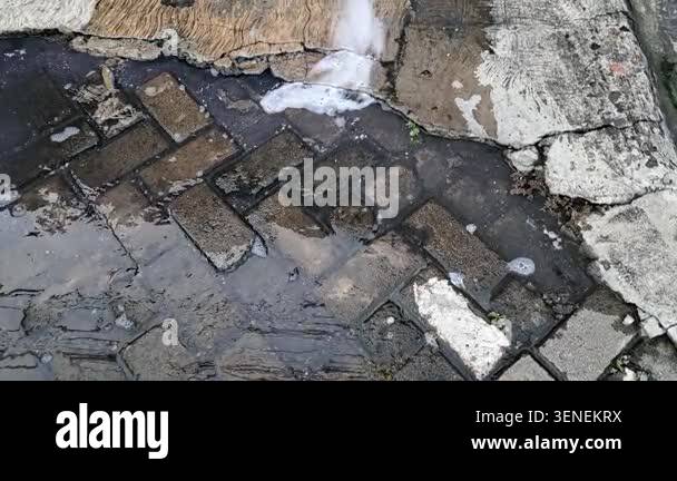 A horizontal close up shot showing clean water splashing heavily with ...