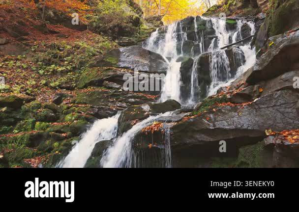 Realtime 4K static video waterfall stream falling down rocks and stones ...