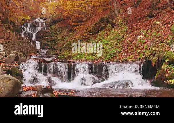Beautiful Waterfall Shipot in the autumn forest of the Carpathian ...
