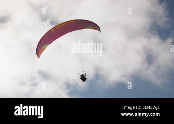 People try paragliding adventure sports flying with colorful parachutes ...