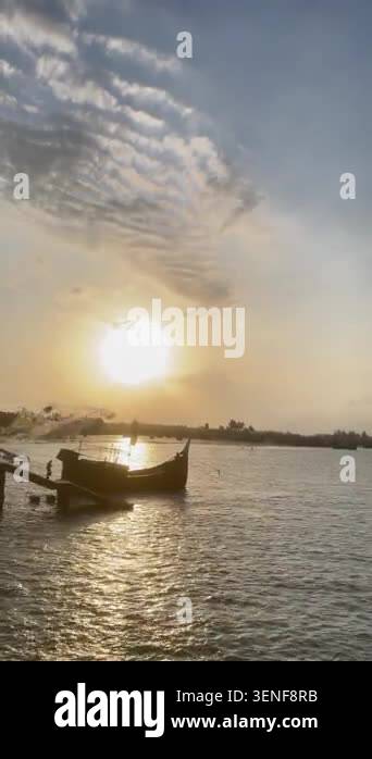 Traditional Wooden Fishing Boat Moored at Bridge During Golden Hour ...