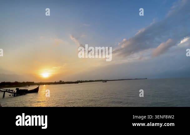 Traditional Wooden Fishing Boat Moored at Bridge During Golden Hour ...