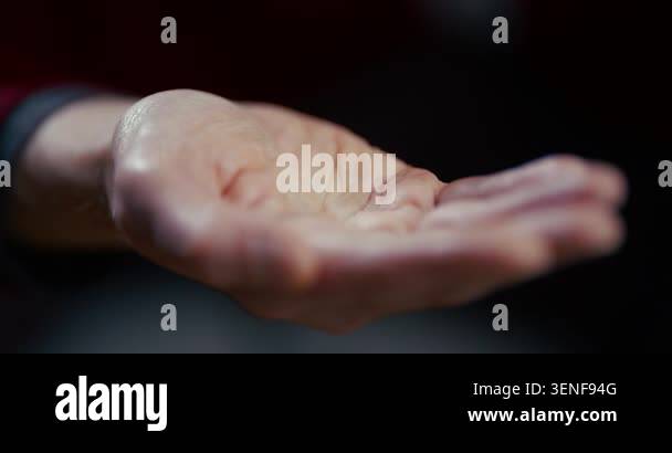 Close-up of an open human hand with palm facing up, isolated against a ...