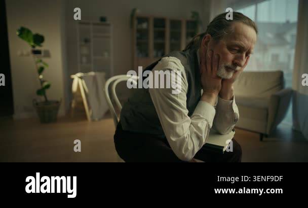 Close-up of a serious pensive elderly aged man in partial profile Stock ...