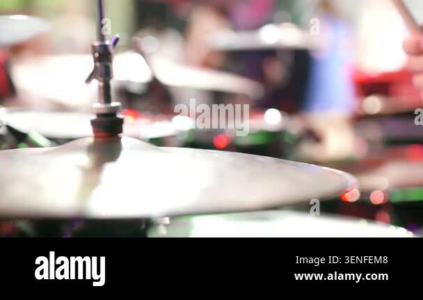 Detailed close-up of a cymbal and stand from a drum kit against a ...