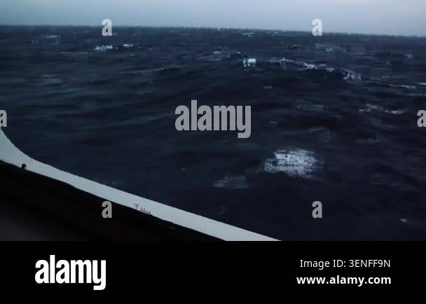 Editorial The ship in a storm at sea, the view from the window of the ...