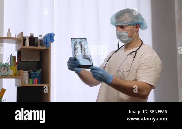 Doctor in the office with an x-ray in his hands. Diagnosis of the ...