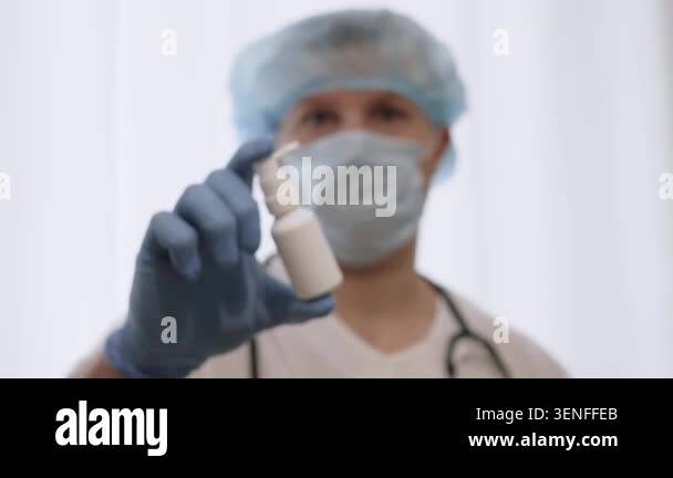 Male doctor with nasal spray in his hands. Pediatrician in the clinic ...
