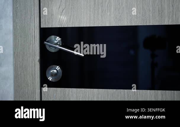 The lock on the door is broken. Pressing the door handle with your hand ...