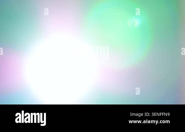 Texture of light rays, green cinematic glare, a strobe light shining, a ...