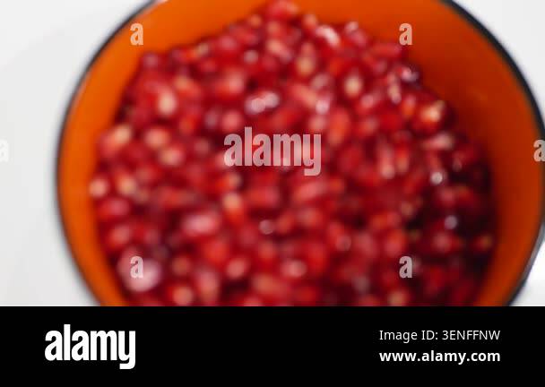 Top view, Peeled pomegranate fruit, ripe pomegranate in a plate, red ...