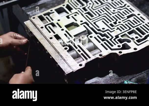 High angle view of a professional technician hands working on ...