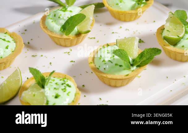 Mini Mojito Tarts, portioned Key Lime Pie tartlets cakes decorated with ...
