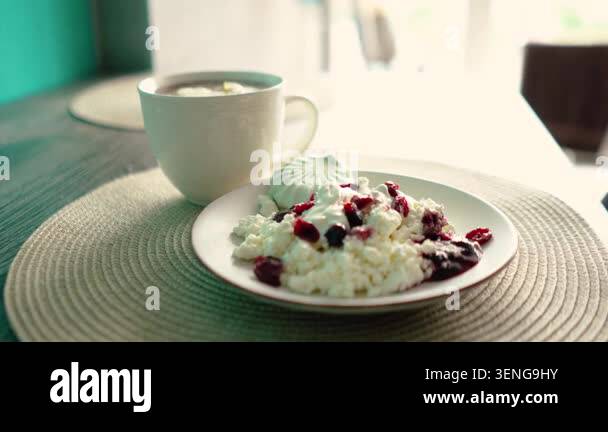 Healthy Cottage Cheese Breakfast with Cranberries and Tea Stock Video ...