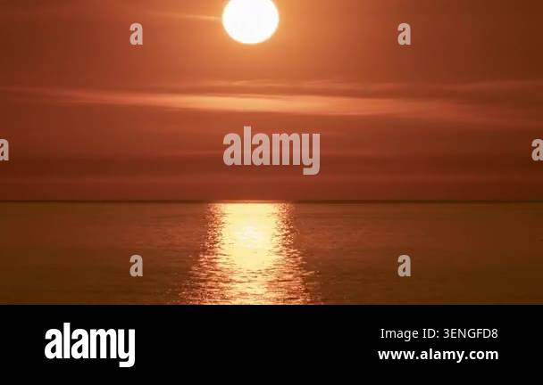 Orange, red sunset. The beautiful image created by the setting sun by ...